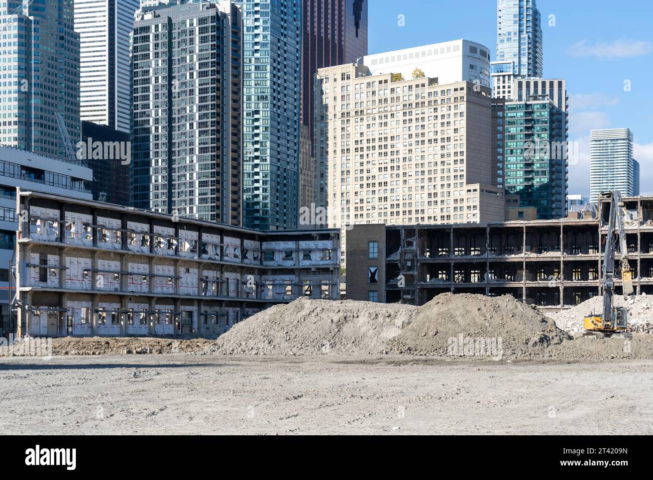 A construction site with new buildings in background in downtown ...