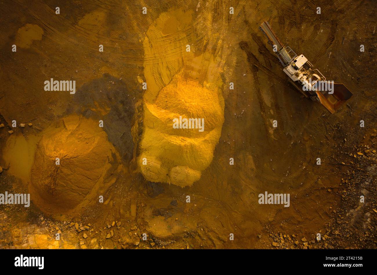 An aerial view of golden rock formations in a mine Stock Photo - Alamy