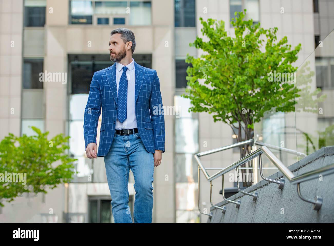 business manager walk on urban background. business manager wearing ...