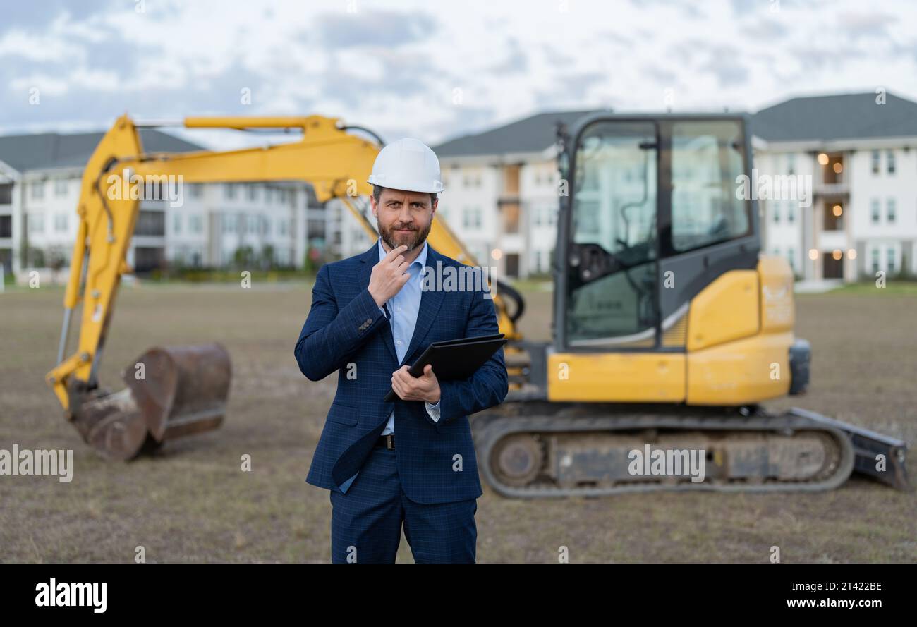 smiling construction inspector engineer architecting outdoor. photo of ...