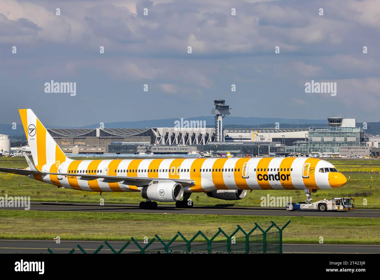 A Condor aircraft being towed, D-ABOJ, CONDOR, BOEING 757-300. Fraport ...