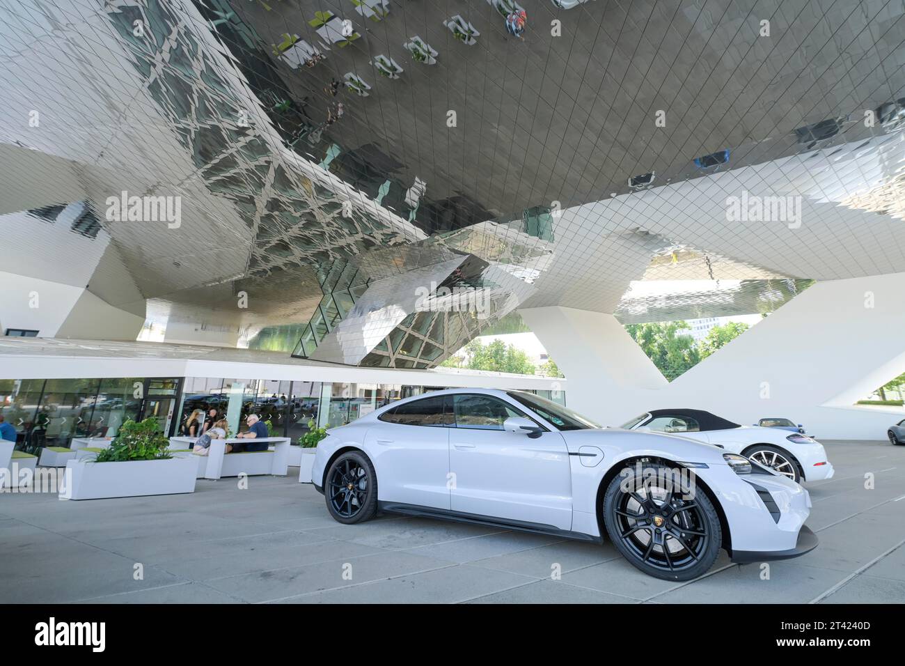 Porsche cars parked in front of the Porsche Museum, Porscheplatz ...