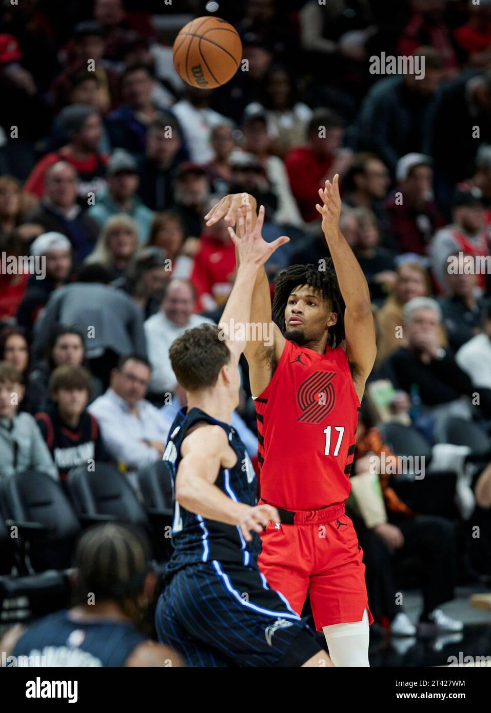 Portland Trail Blazers guard Shaedon Sharpe, right, shoots over Orlando ...