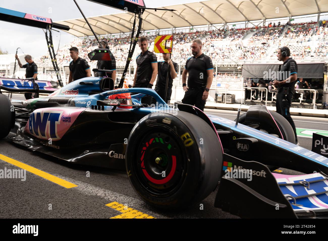 Esteban Ocon driving the Alpine car number 31 arrives in the pit lane ...