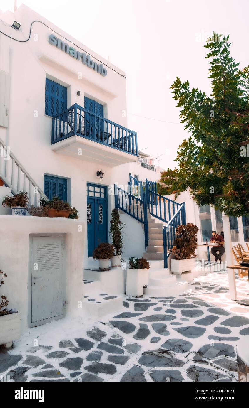 A stunning image of a series of white-walled buildings adorned with ...