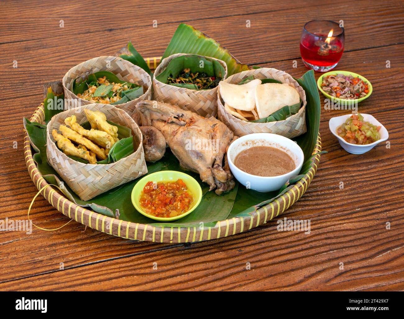 Ingkung Ayam, a traditional food from Yogyakarta, Indonesia, made from ...