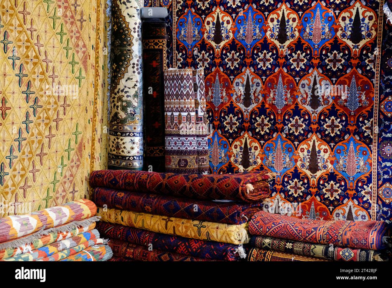 Carpet being rolled and displayed at a carpet exhibition in pune ...