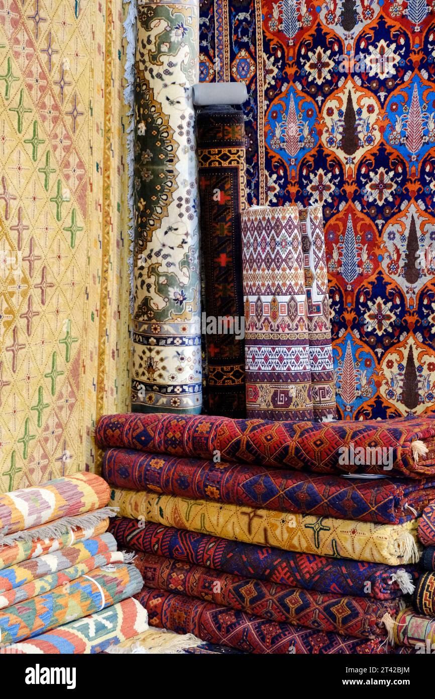 Carpet being rolled and displayed at a carpet exhibition in pune ...