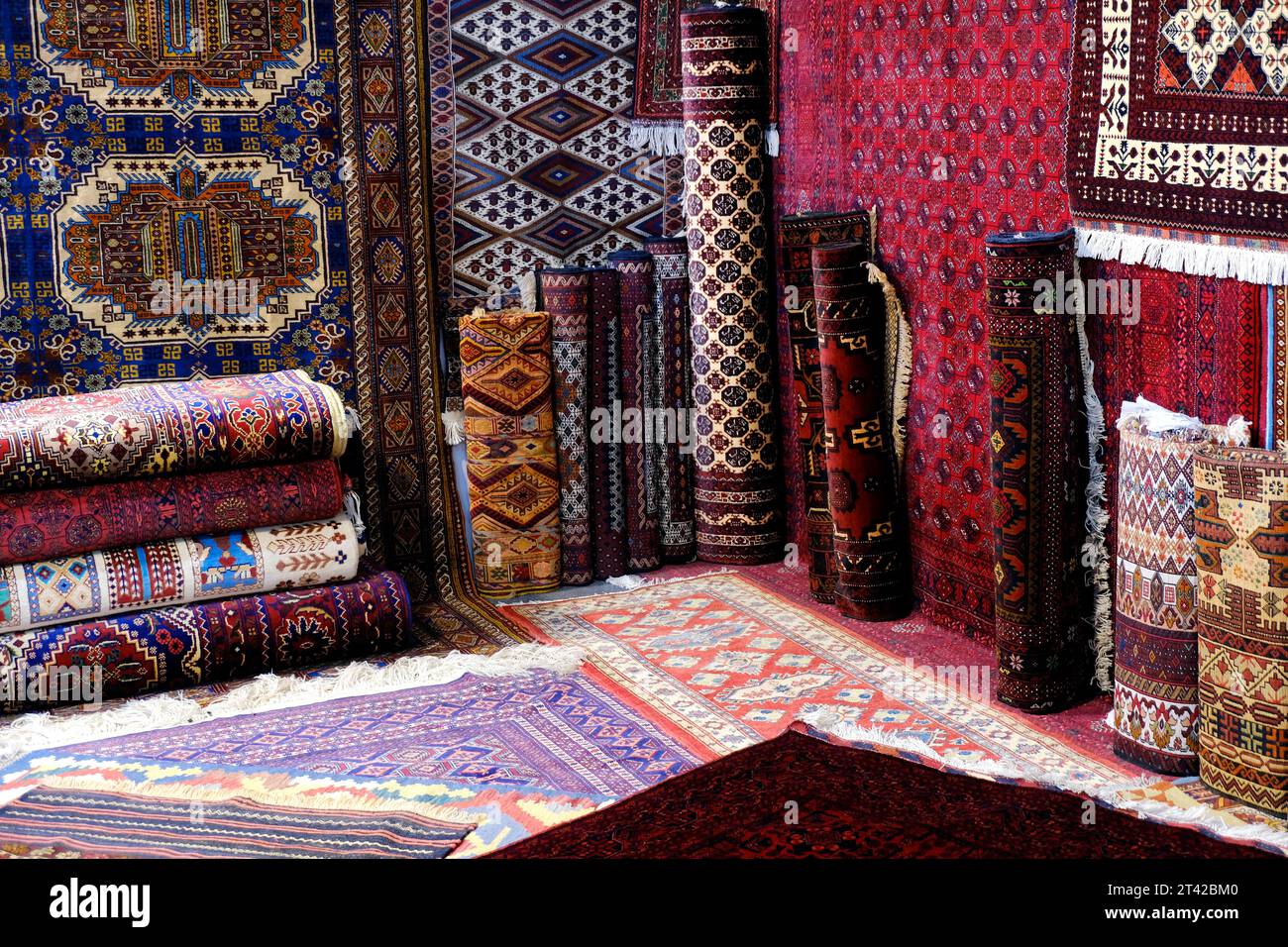 Carpet being rolled and displayed at a carpet exhibition in pune ...