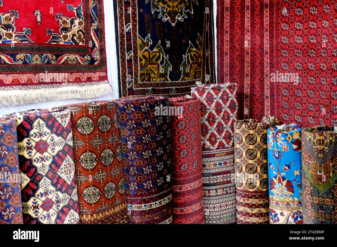 Carpet being rolled and displayed at a carpet exhibition in pune ...