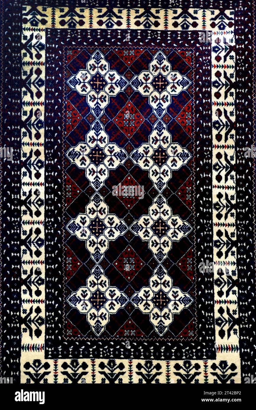 Carpet being rolled and displayed at a carpet exhibition in pune ...