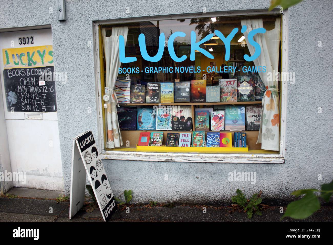 A well-stocked book store featuring an eye-catching window display of ...