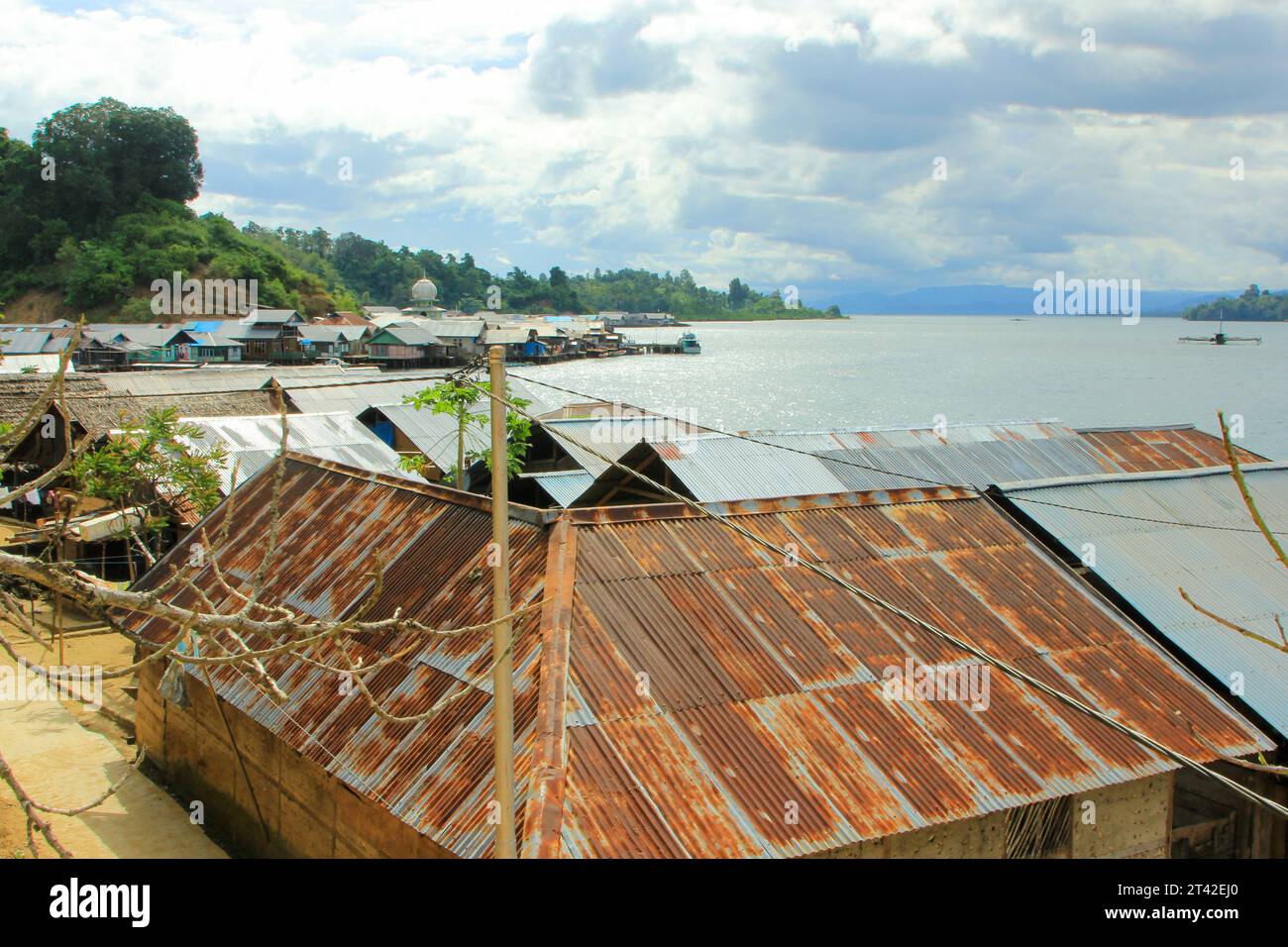 Bajo, North Maluku, Indonesia - August 11, 2017: Wooden stilt houses ...