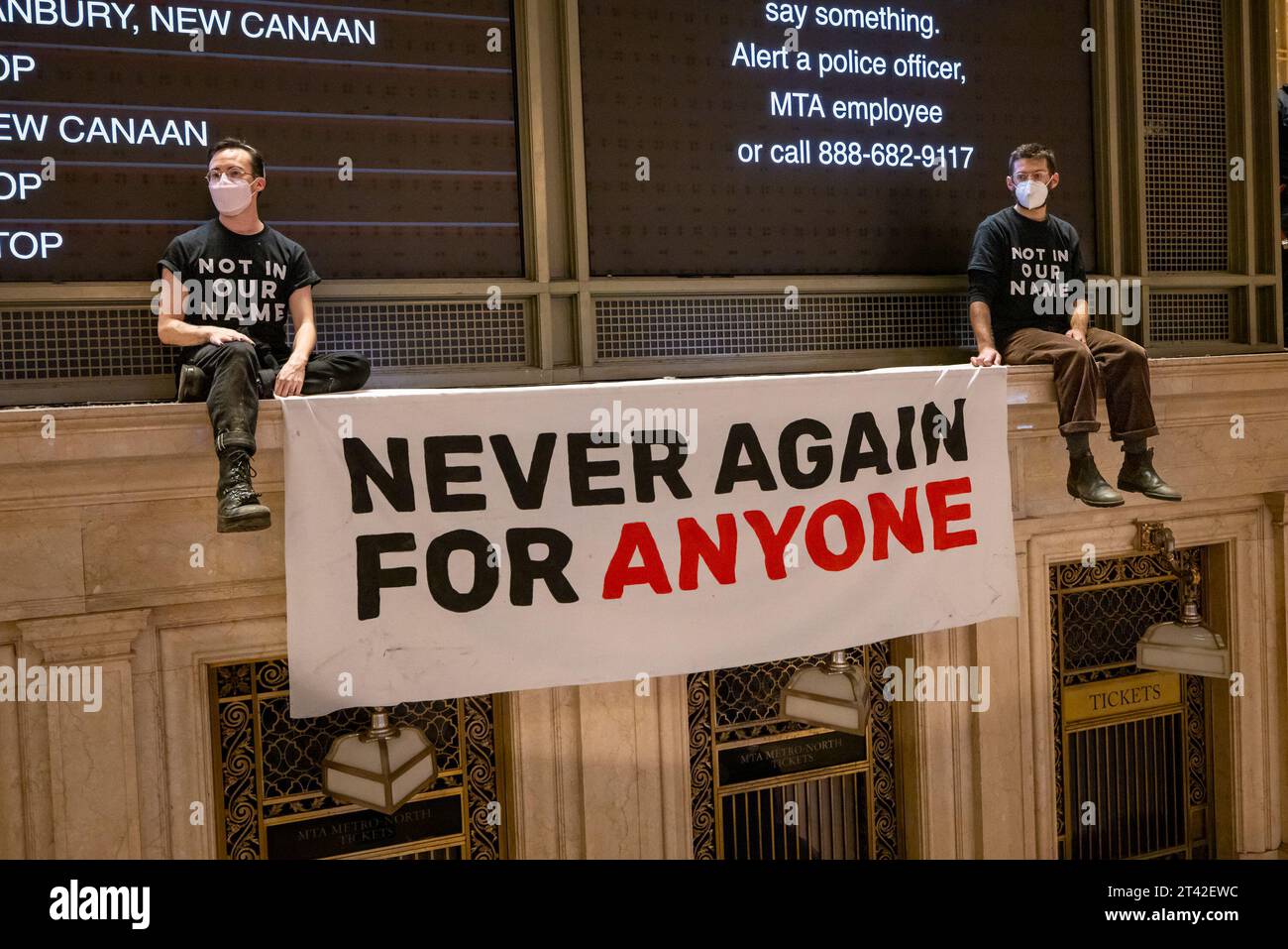 NEW YORK, NEW YORK - OCTOBER 27: Protesters climb on top of an ...