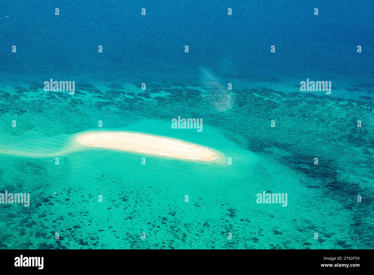 Aerial view of a tropical paradise - an uninhabited sand island in the ...