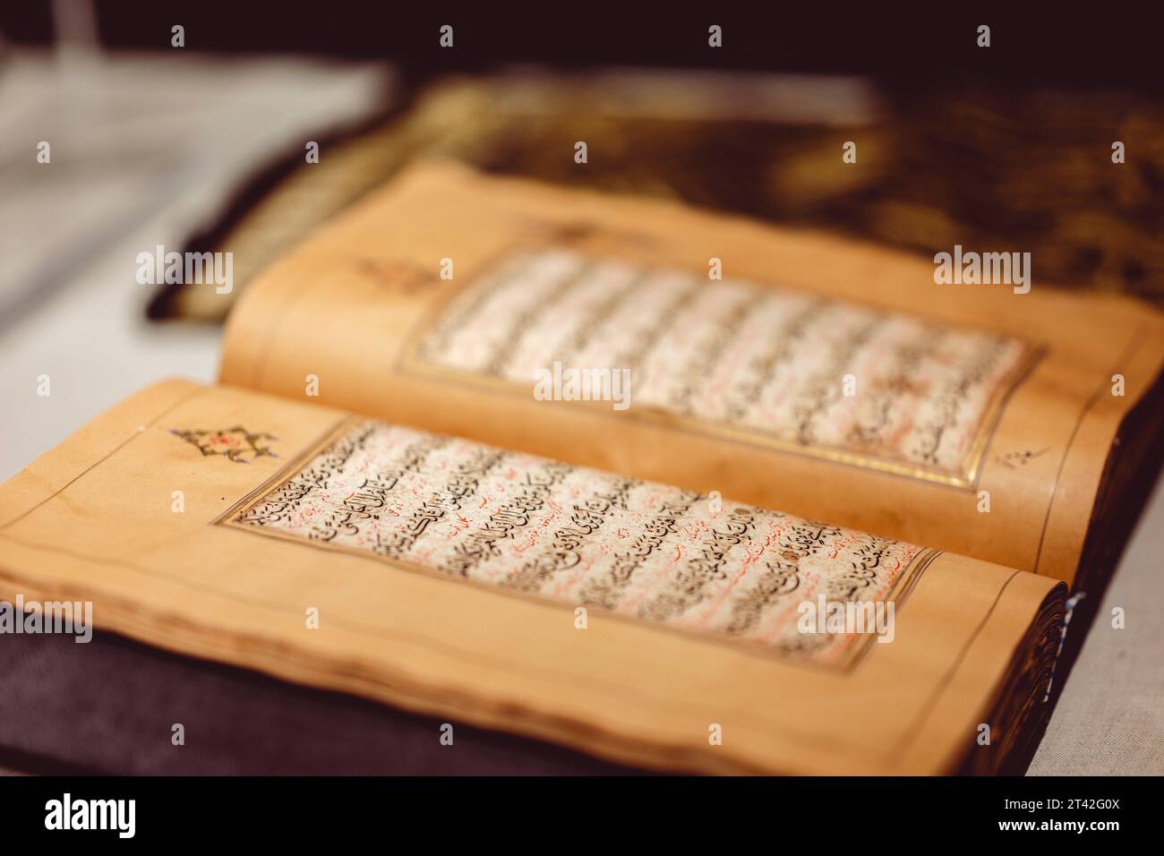 A closeup of Ancient Christian Bible, written in Arabic with a blurry ...