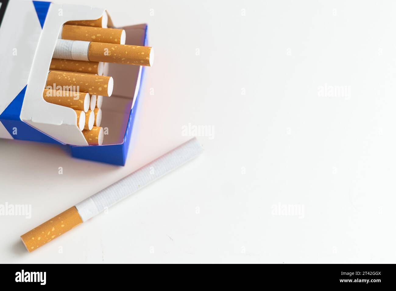 Pack full of filtered cigarettes on white isolated background Stock ...