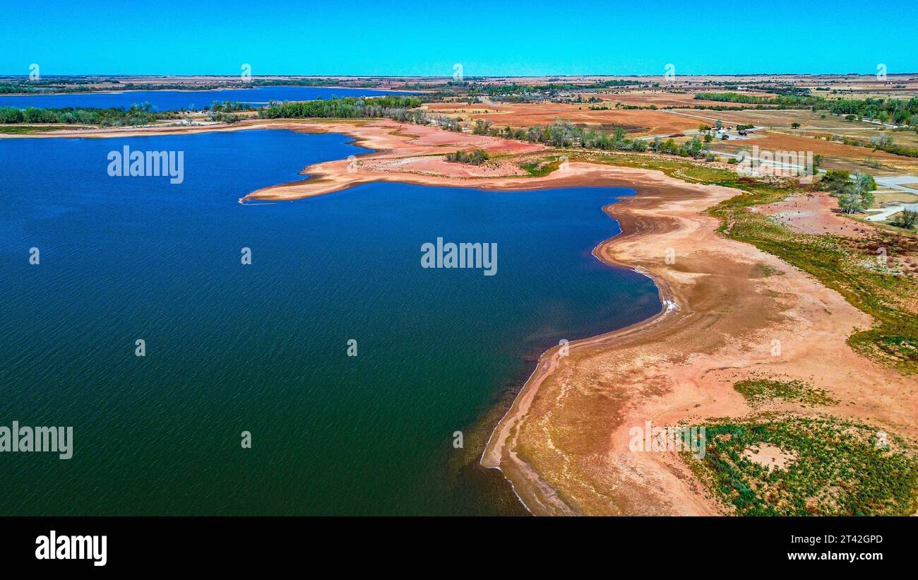 A stunning aerial view of a sun-soaked beachfront landscape Stock Photo ...