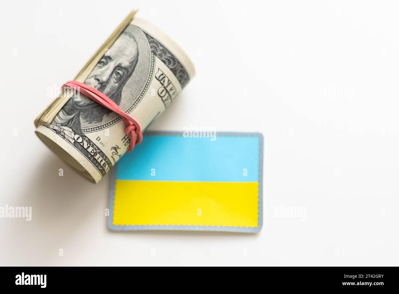 dollars against the background of the Ukrainian flag. The war in ...