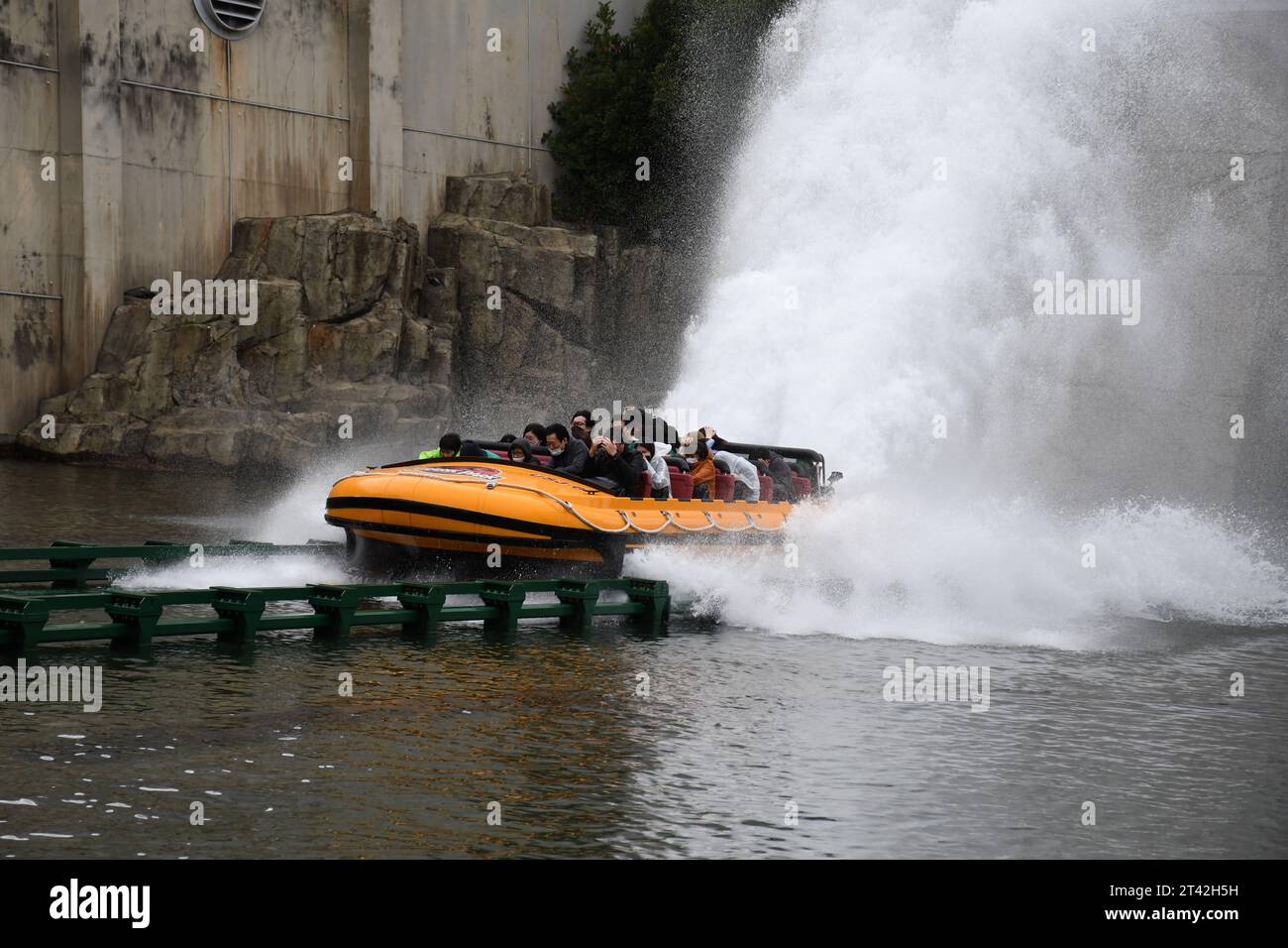 The people riding a water attraction at an amusement park in Osaka ...