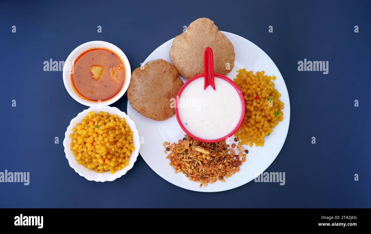 Indian food - Puri Bhaji and kheer. North Indian semi dry Potato Spicy ...