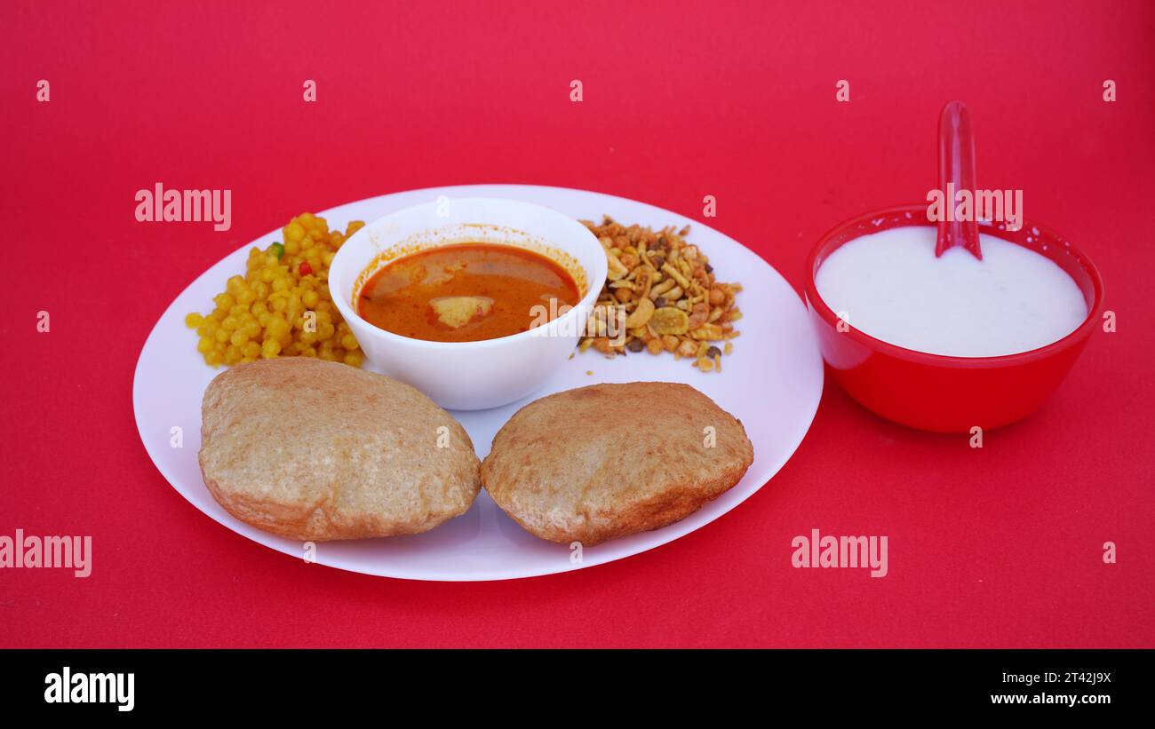 Indian food - Puri Bhaji and kheer. North Indian semi dry Potato Spicy ...