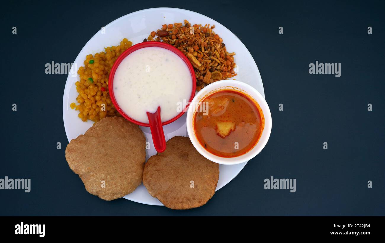 Indian food - Puri Bhaji and kheer. North Indian semi dry Potato Spicy ...