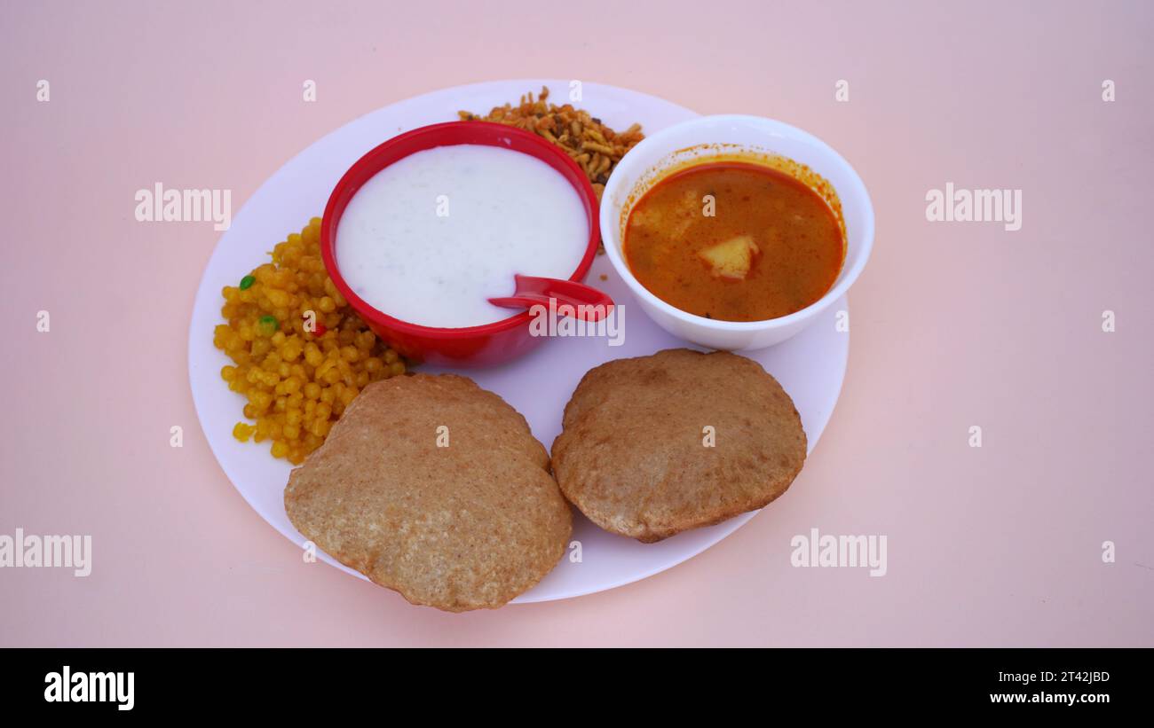 Indian food - Puri Bhaji and kheer. North Indian semi dry Potato Spicy ...