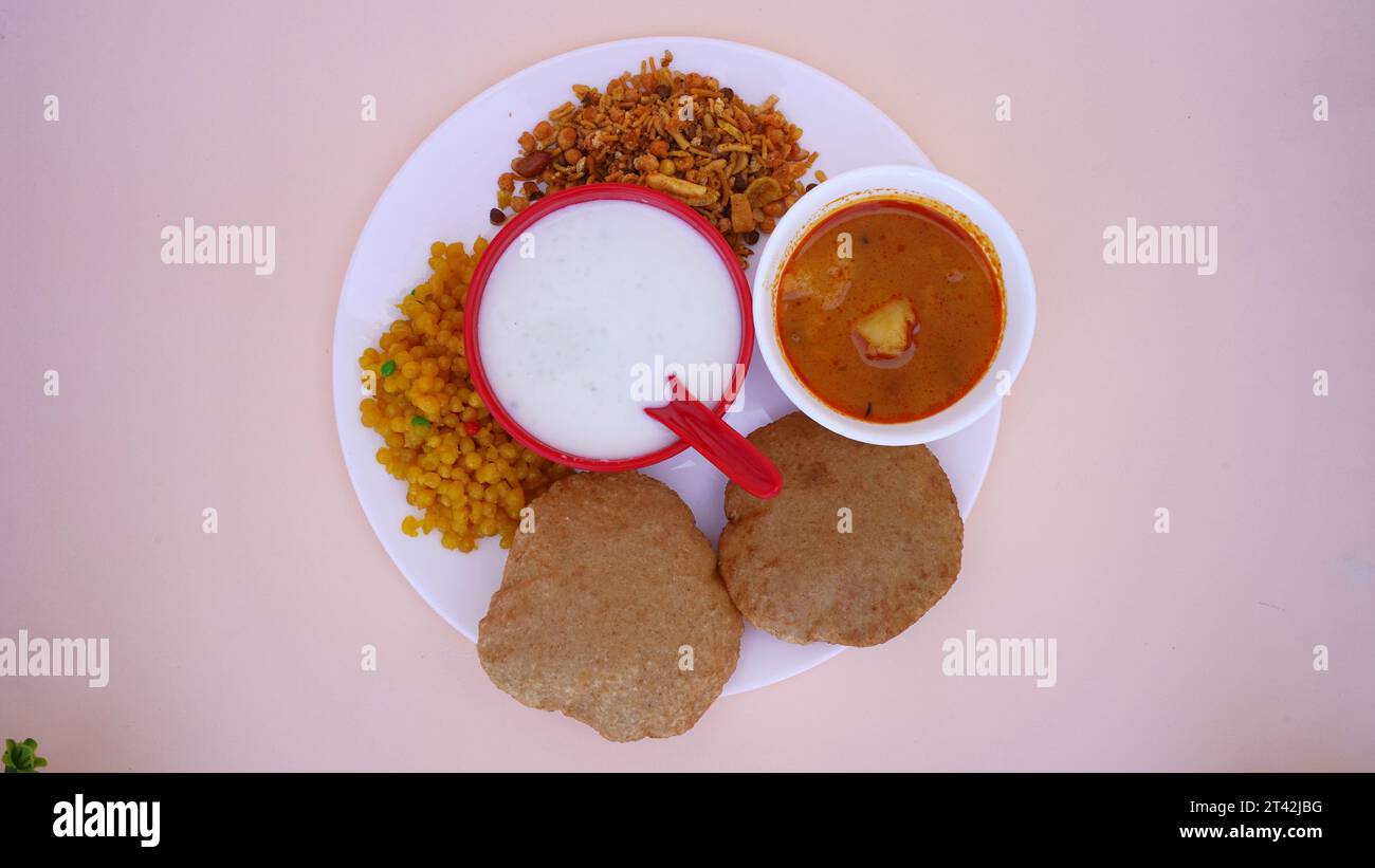 Indian food - Puri Bhaji and kheer. North Indian semi dry Potato Spicy ...