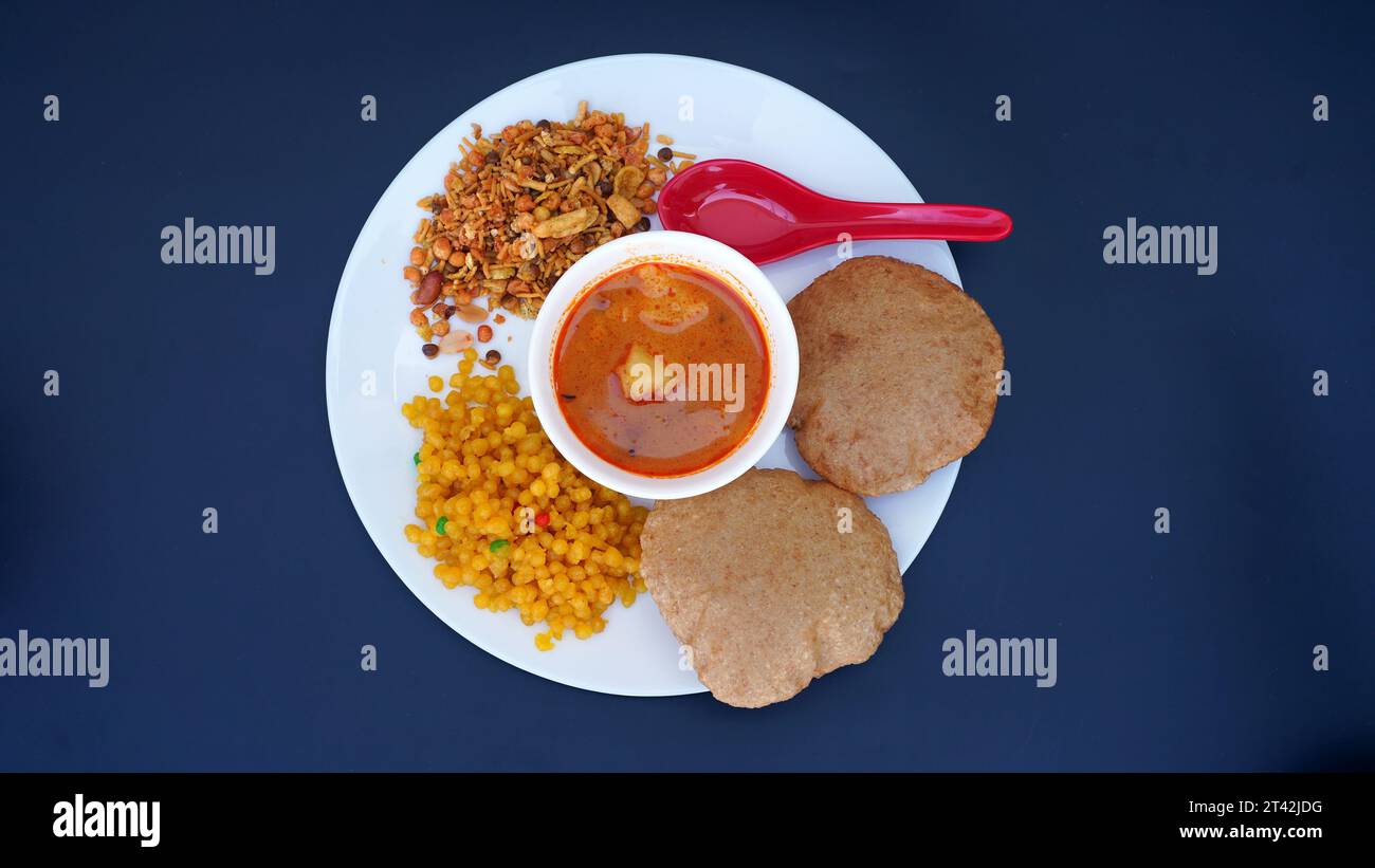 Indian food - Puri Bhaji and kheer. North Indian semi dry Potato Spicy ...