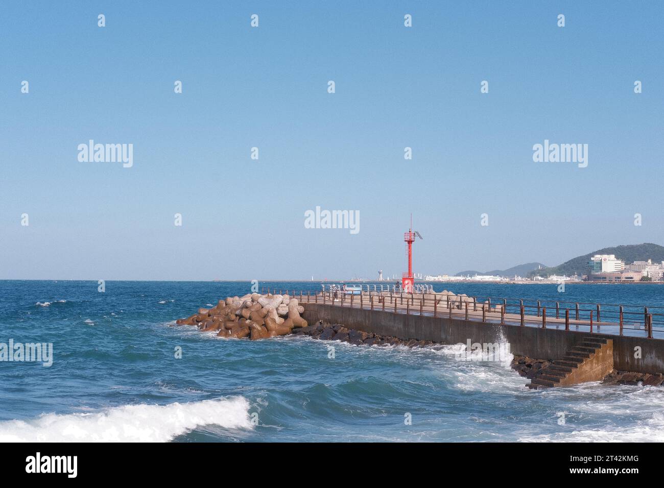 A majestic, iconic lighthouse on the coast of Jeju Island, South Korea ...