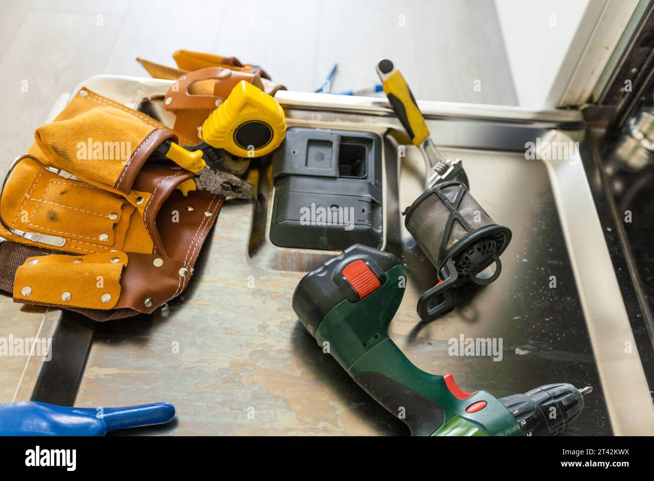 repairing a dishwasher with tools Stock Photo - Alamy