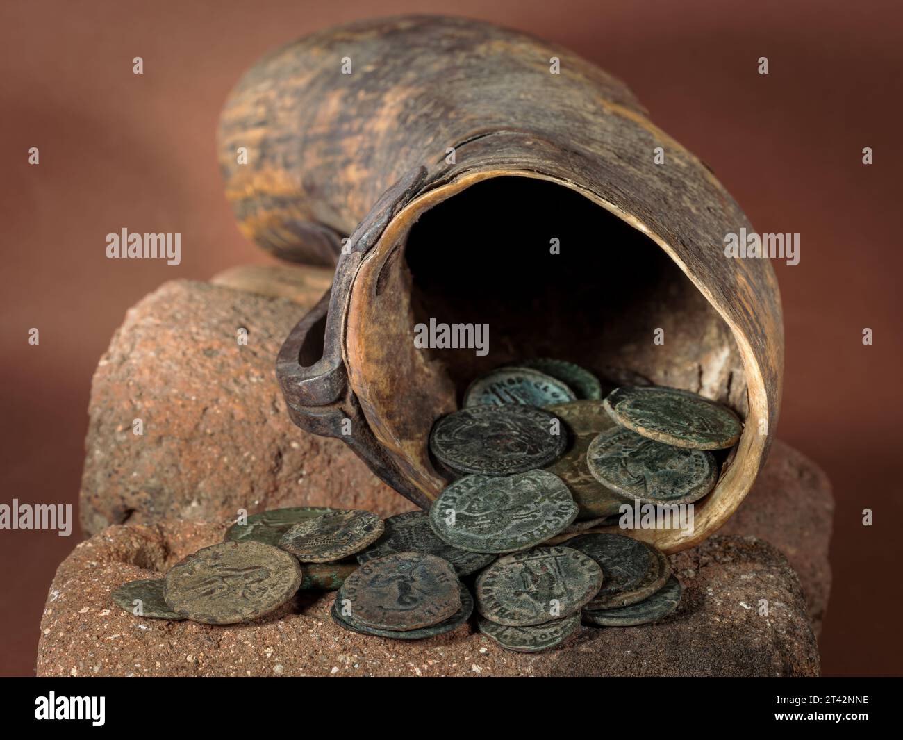 Ancient Roman coins coming out of a cornucopia Stock Photo - Alamy