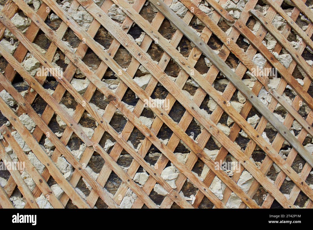 wooden mesh background on an old house made of wood beams Stock Photo ...