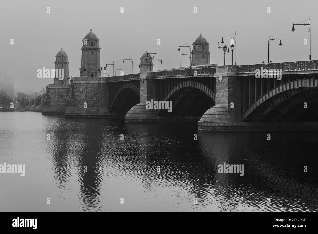 A black and white photograph of a the Longfellow Bridge in Boston over ...