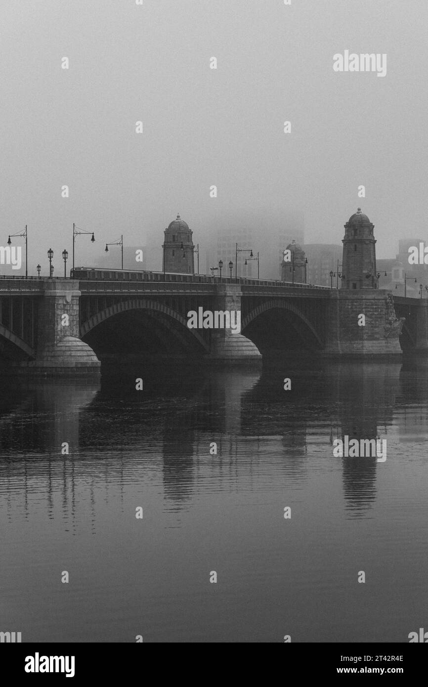 A black and white photograph of a the Longfellow Bridge in Boston over ...