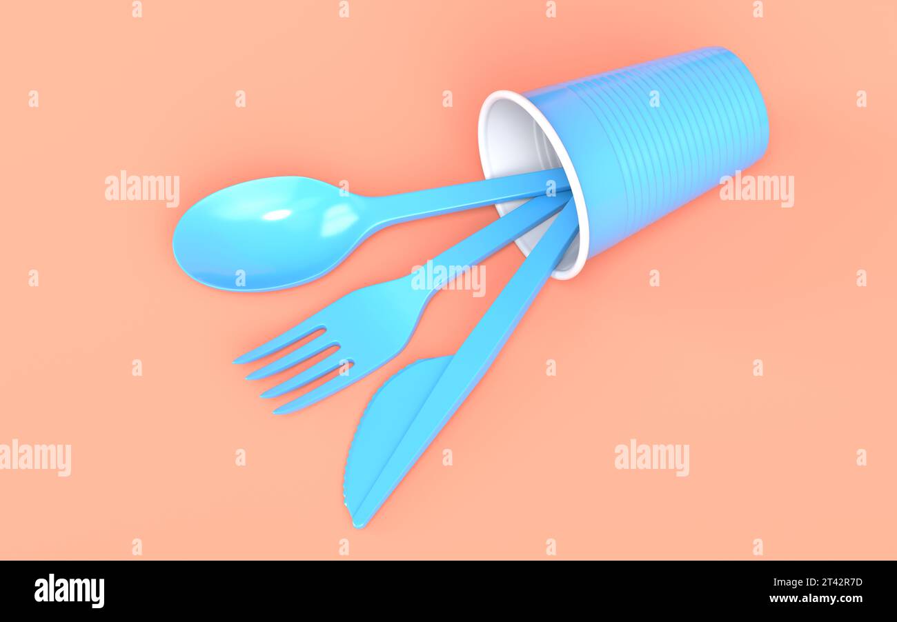 Set of disposable utensils like folk, spoon, knife and cup on ...