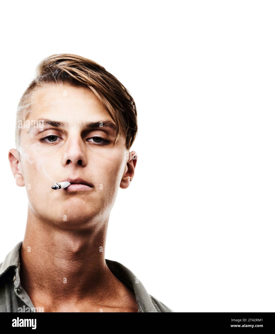 Portrait, face and man smoking cigarette isolated against a white ...