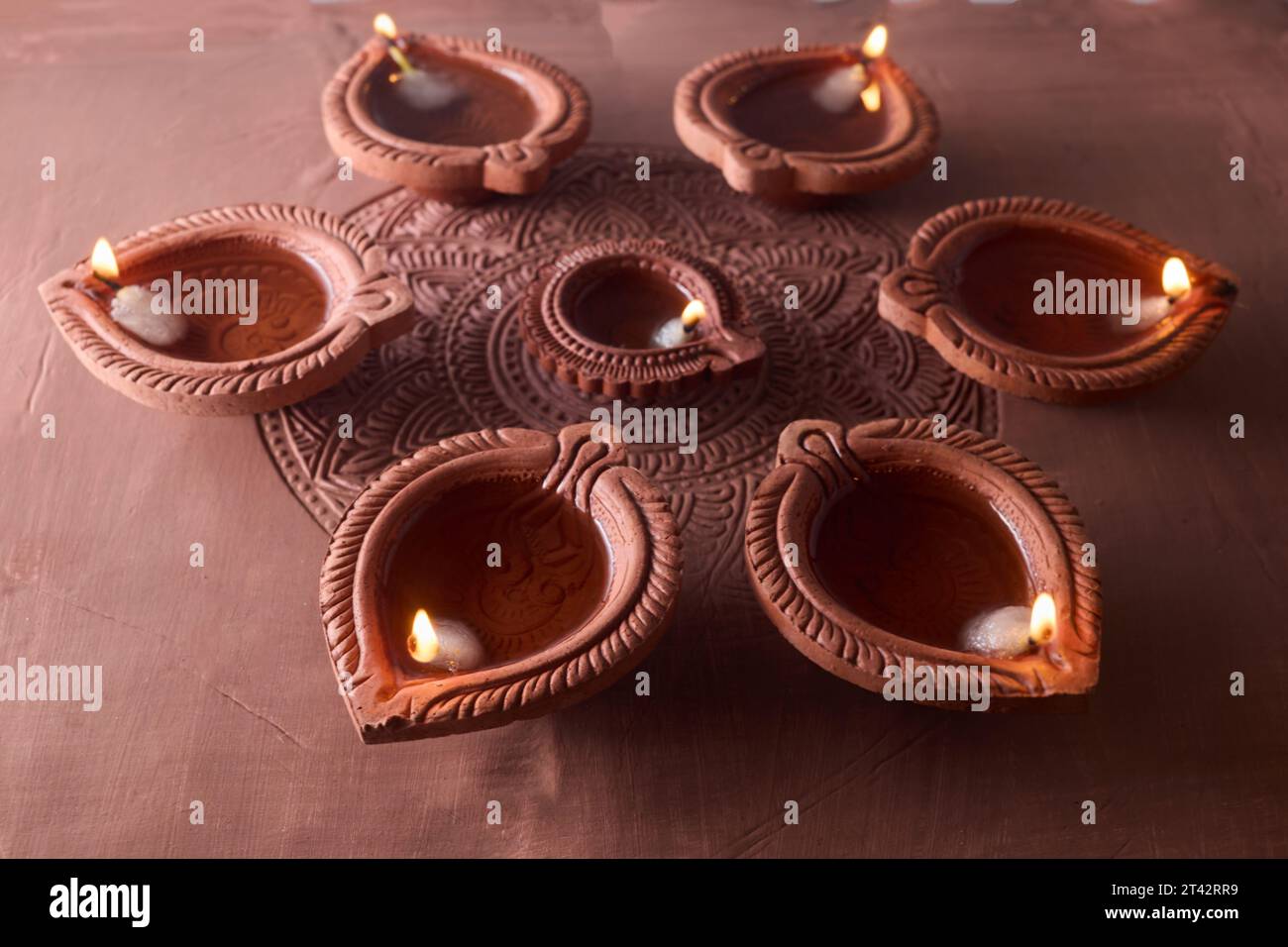 Burning diya on Happy Diwali, background for light festival of India ...