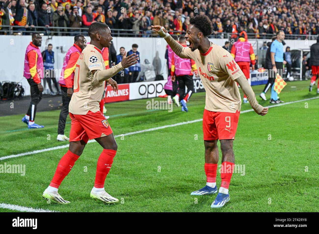 Elye Wahi (9) of RC Lens celebrates with his teammate David Costa (10 ...
