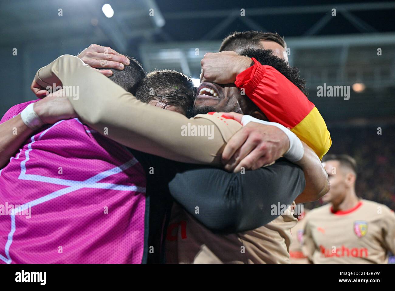Elye Wahi (9) of RC Lens celebrates with his teammates after scoring ...