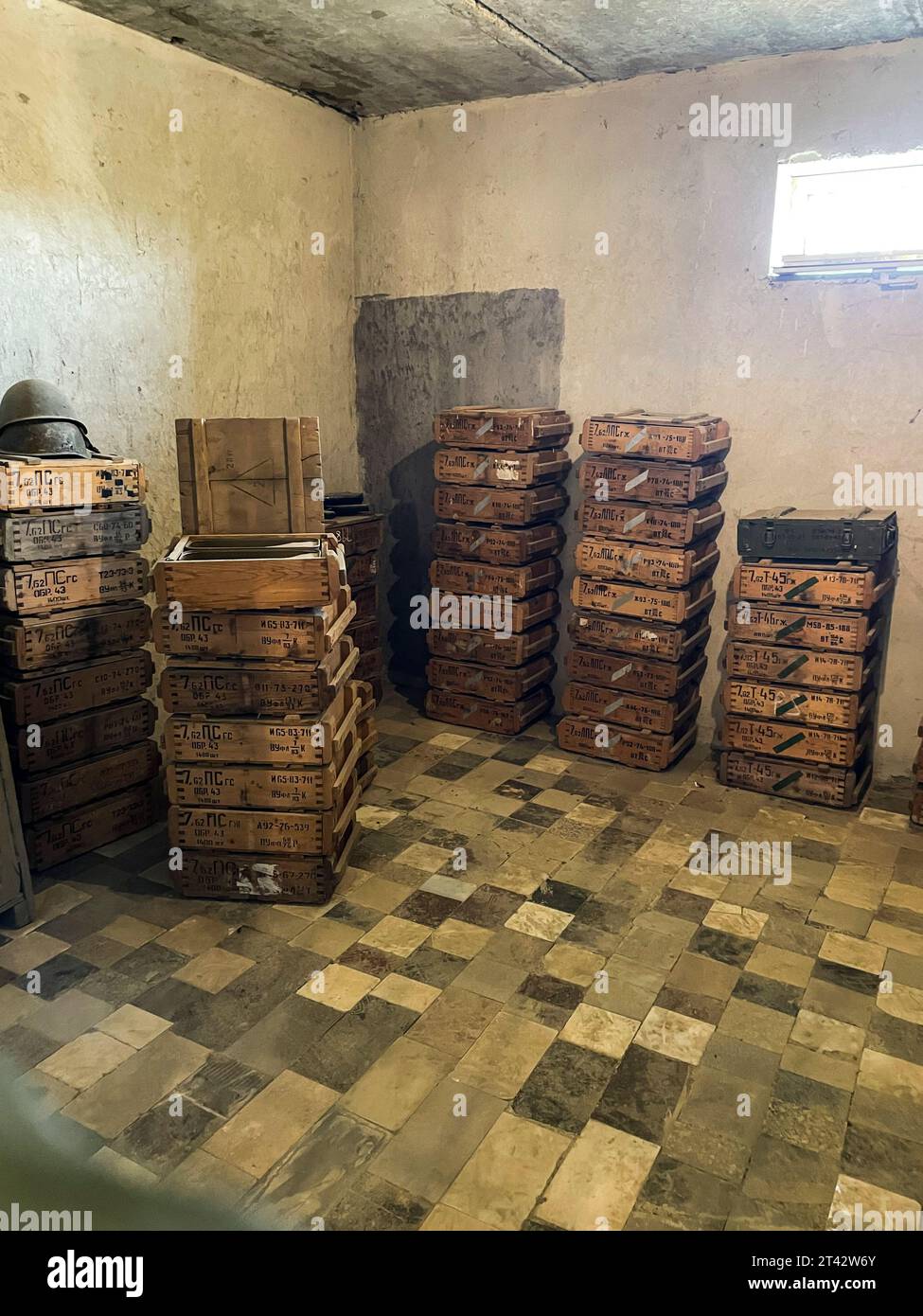 Stacked wood crates in the weapon storage area room. In a recreation of ...