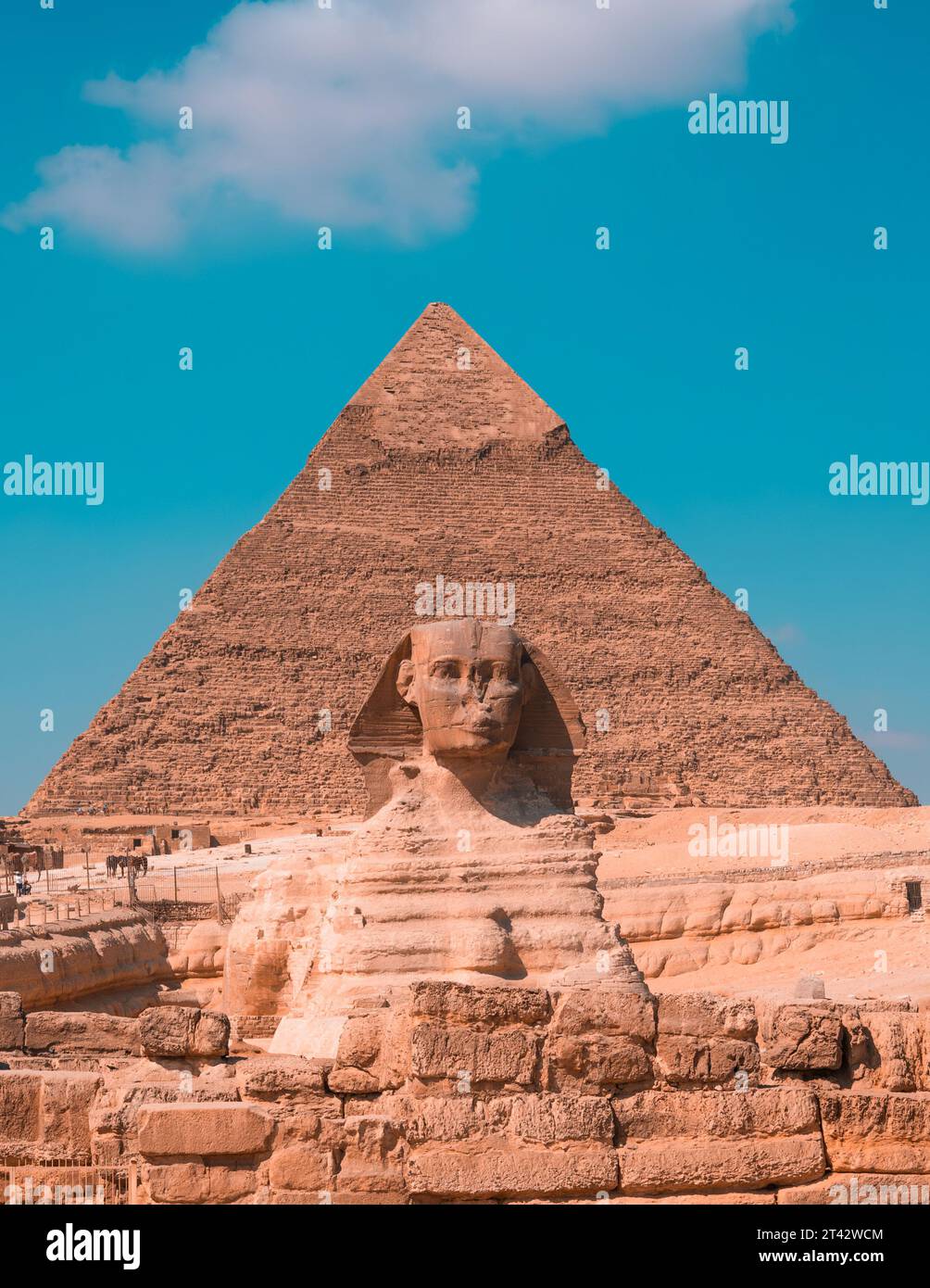The Sphinx guards the Great Pyramids of Giza overlooking Cairo Stock ...