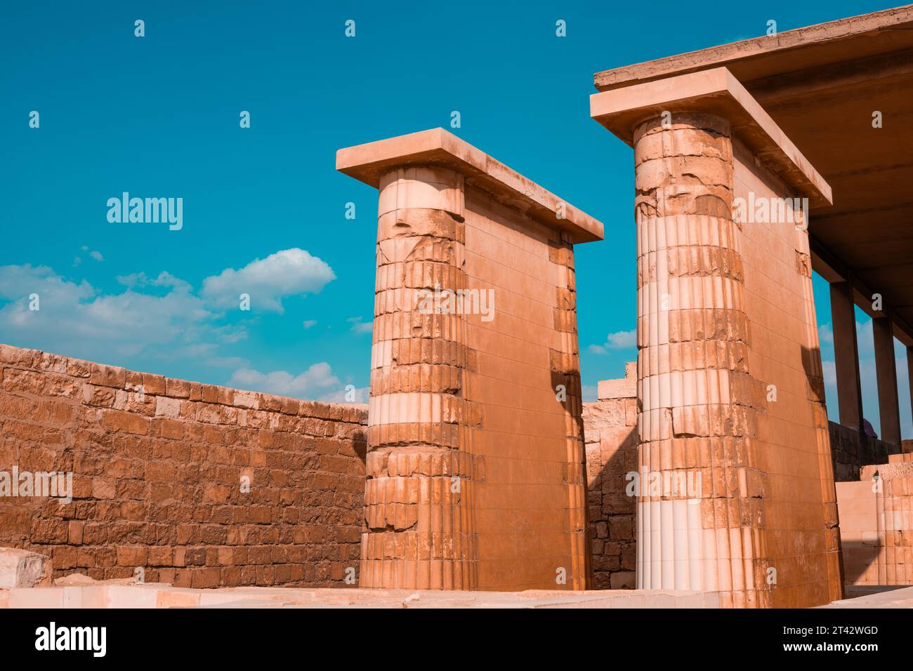 Majestic columns and ancient stone walls at the Step Pyramid complex in ...