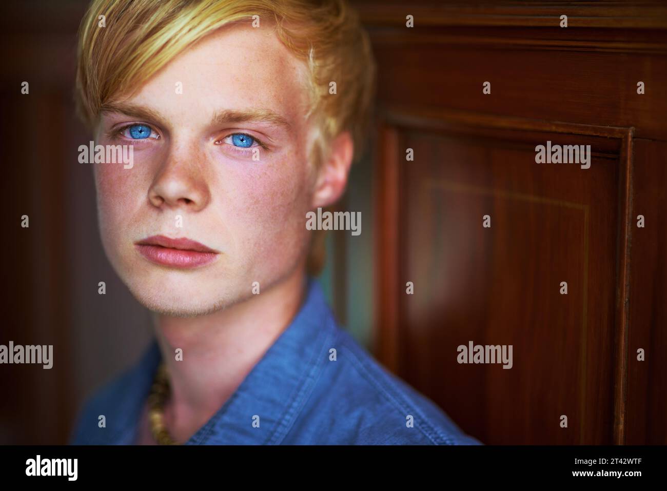 Serious, face and teenager in home thinking of future in high school ...