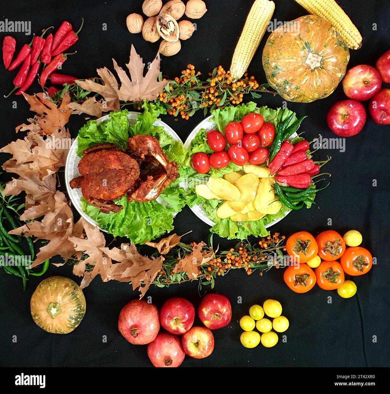 A plate of diverse food items, including a variety of meat, vegetables ...