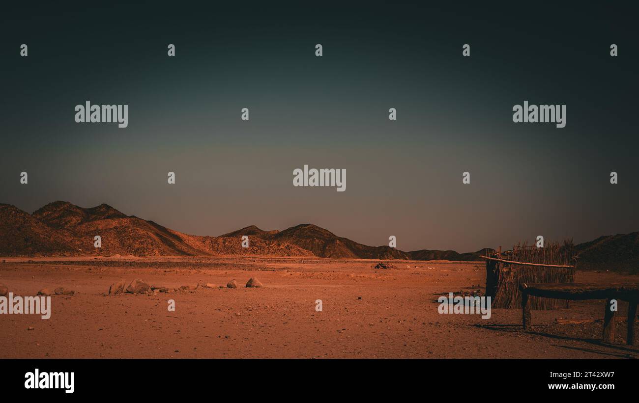 The serene landscape of a Bedouin village in the desert Stock Photo - Alamy