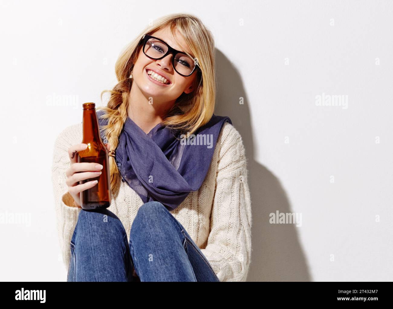 Happy woman, portrait and relax with beer of nerd, geek or hipster ...
