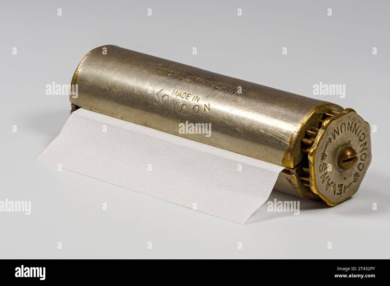 An Evans Patent Concinnum Machine, a vintage cigarette rolling device ...