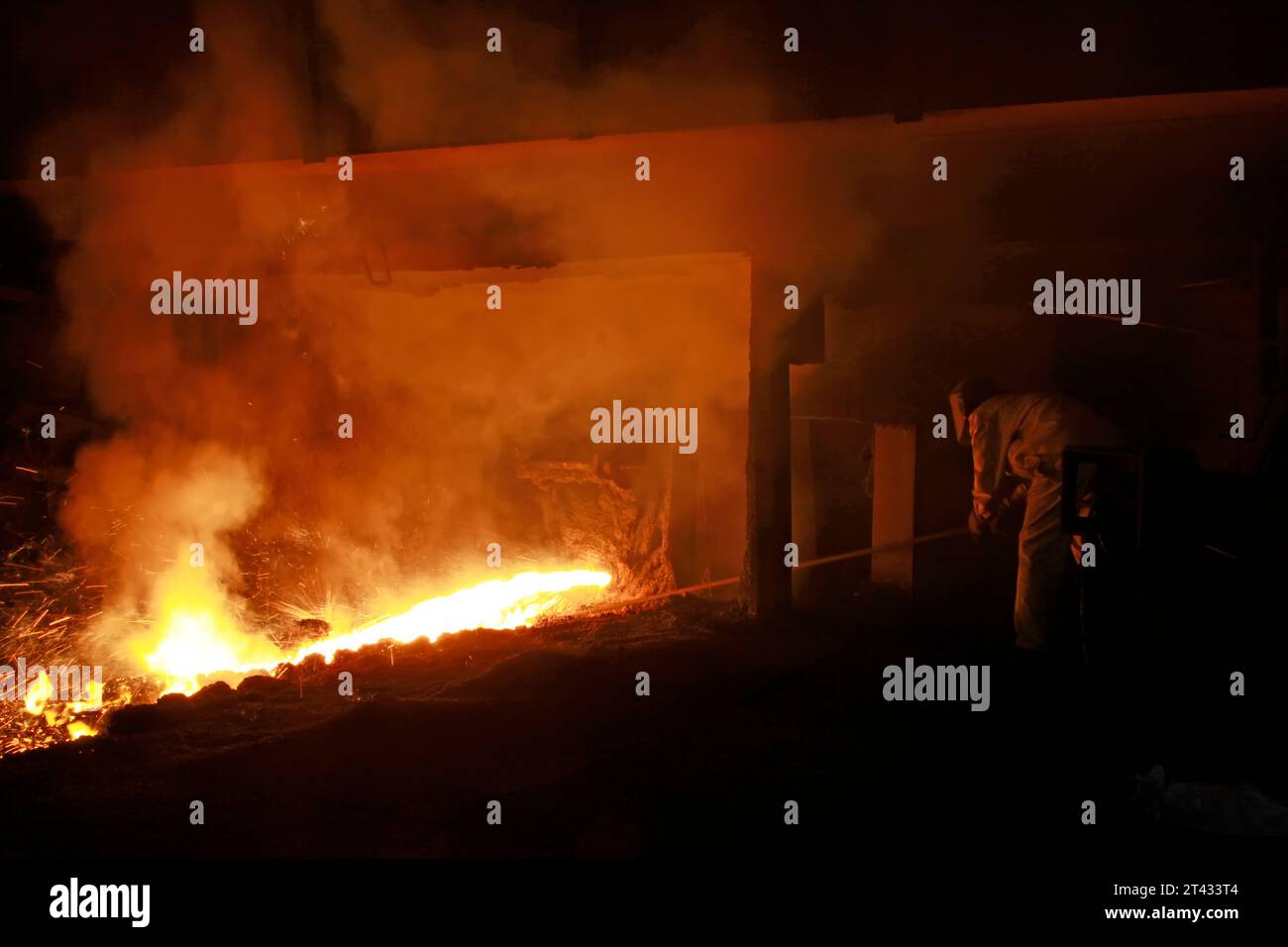 hot molten iron flowing from blast furnace, closeup of photo Stock ...